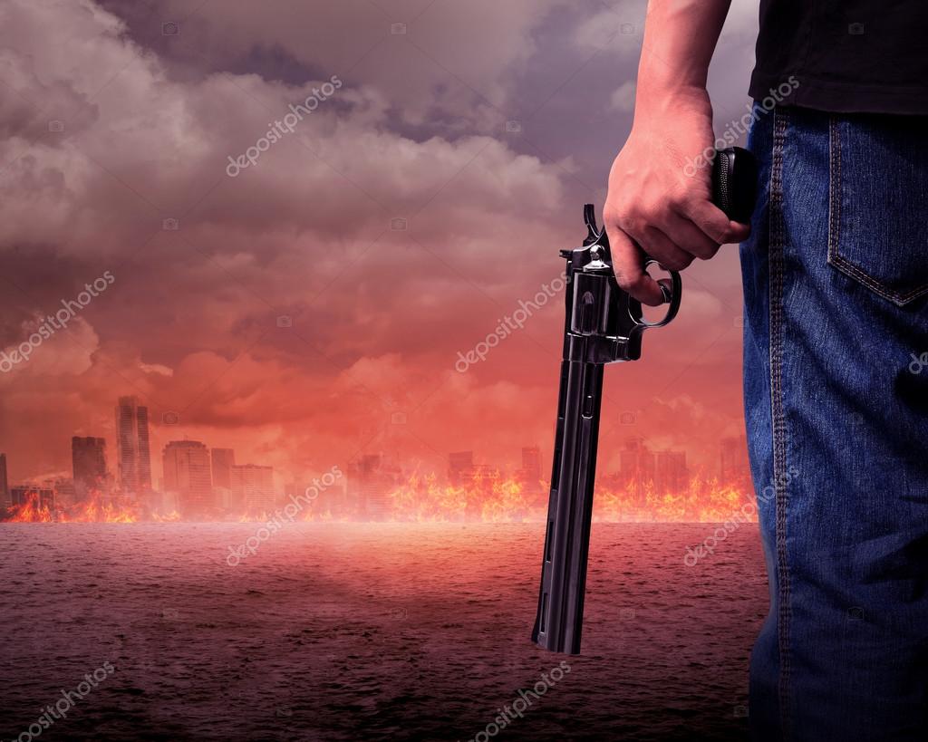Man hand holding gun — Stock Photo © leolintang #87839048