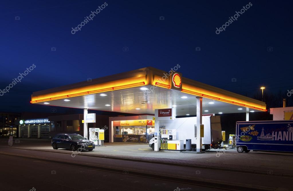 Gas station at night — Stock Editorial Photo © hansenn #93219874