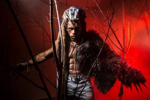 Muscular man with dreadlocks werewolf on a colorful background. — Stock ...