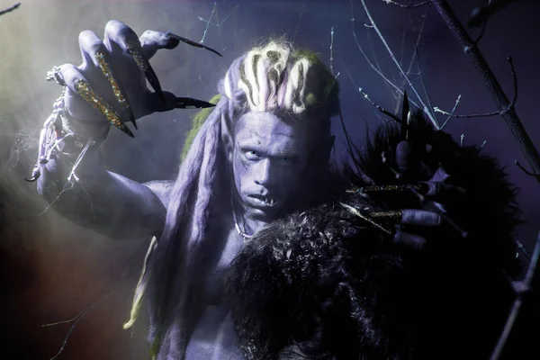 Muscular man with dreadlocks werewolf on a colorful background. — Stock ...