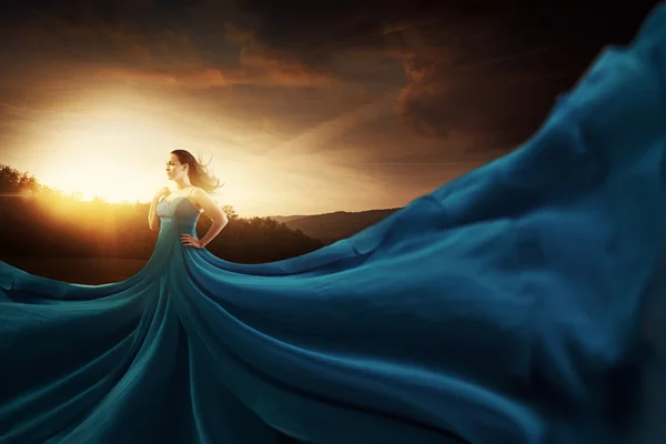 Woman flowing dress Stock Photos, Royalty Free Woman flowing dress ...