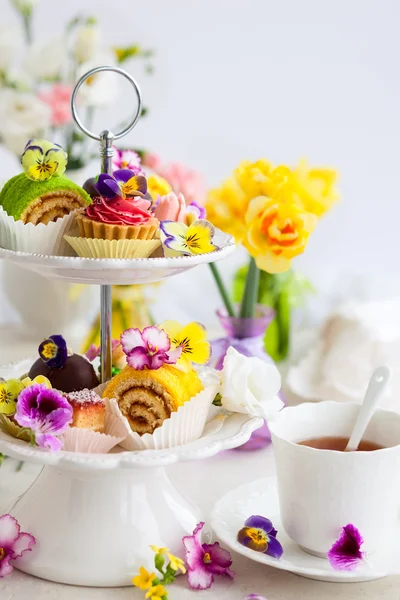 Assorted cakes and pastries on a cake Stock Photo by ©sarsmis 70821263