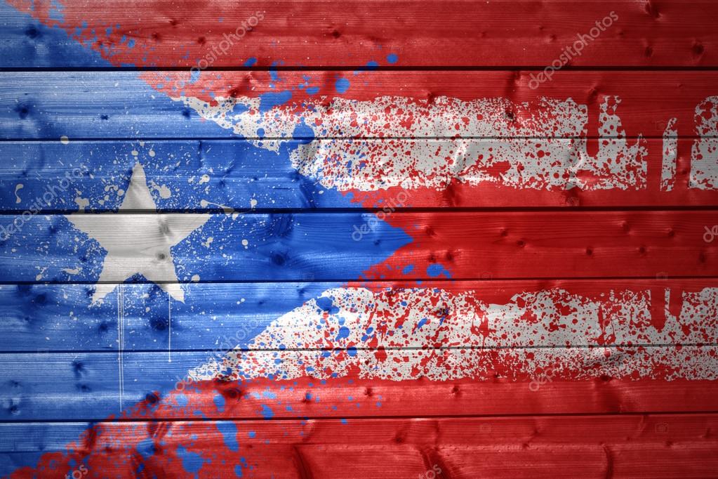 Painted puerto rico flag on a wooden texture — Stock Photo © Ruletkka ...