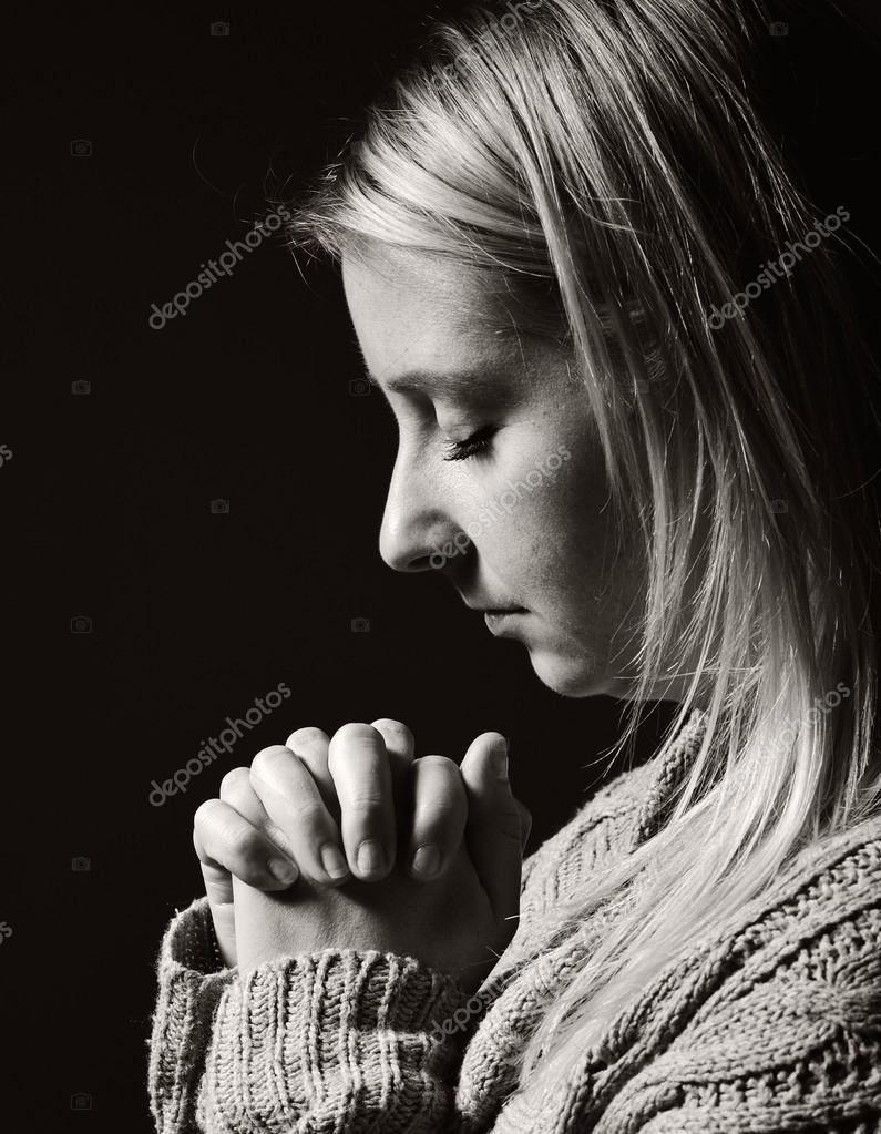 Young Praying woman. — Stock Photo © itsmejust #65366939