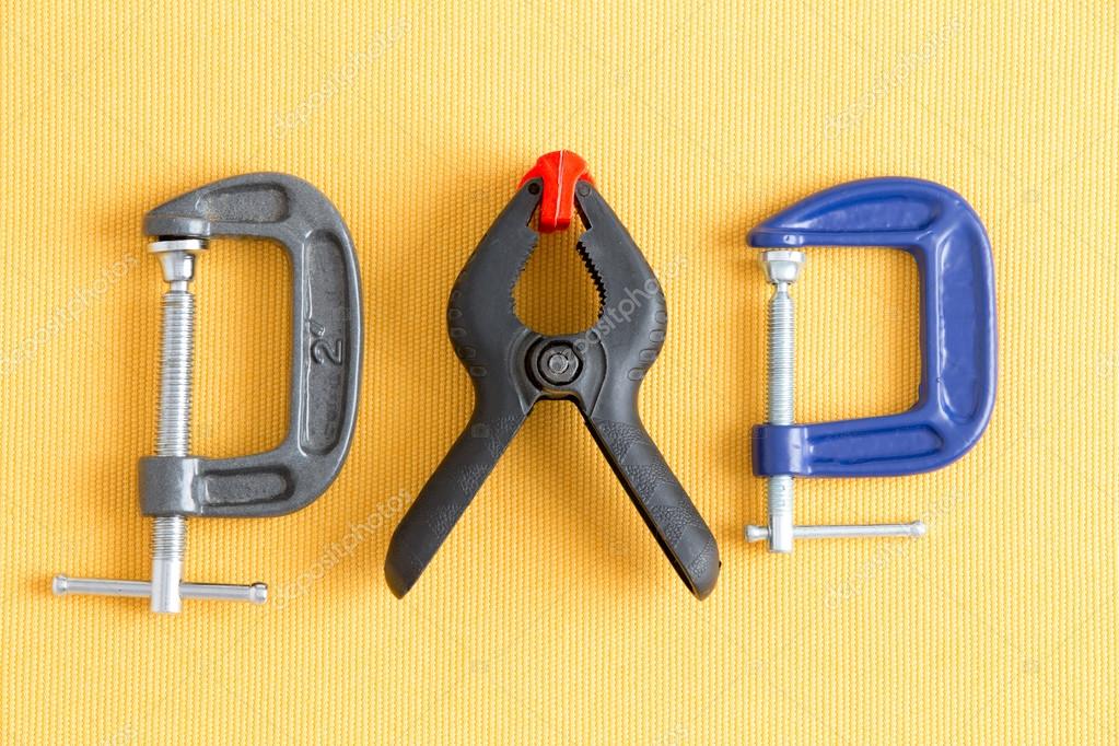 Assorted clamps from Dad's tool kit Stock Photo by ©oocoskun 68418115
