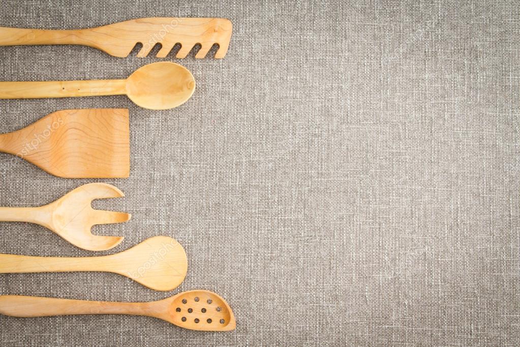 Wooden cooking utensils border — Stock Photo © oocoskun #68950907