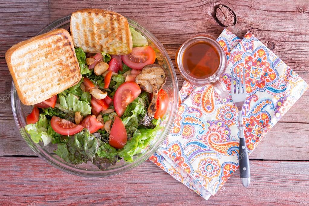 Healthy mixed leafy green salad with tea Stock Photo by ©oocoskun 71796579