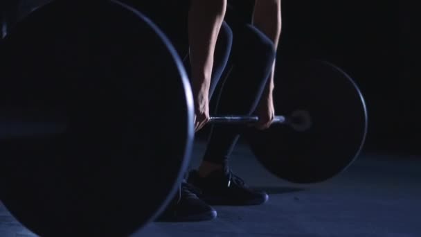 Military overhead shoulder push press. Young female loaded barbell ...