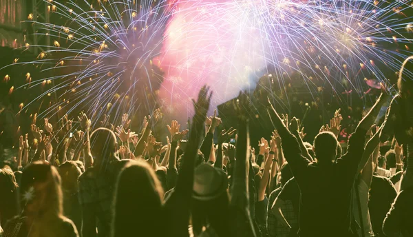 Cheering crowd and fireworks Stock Photo by ©melis82 115008882