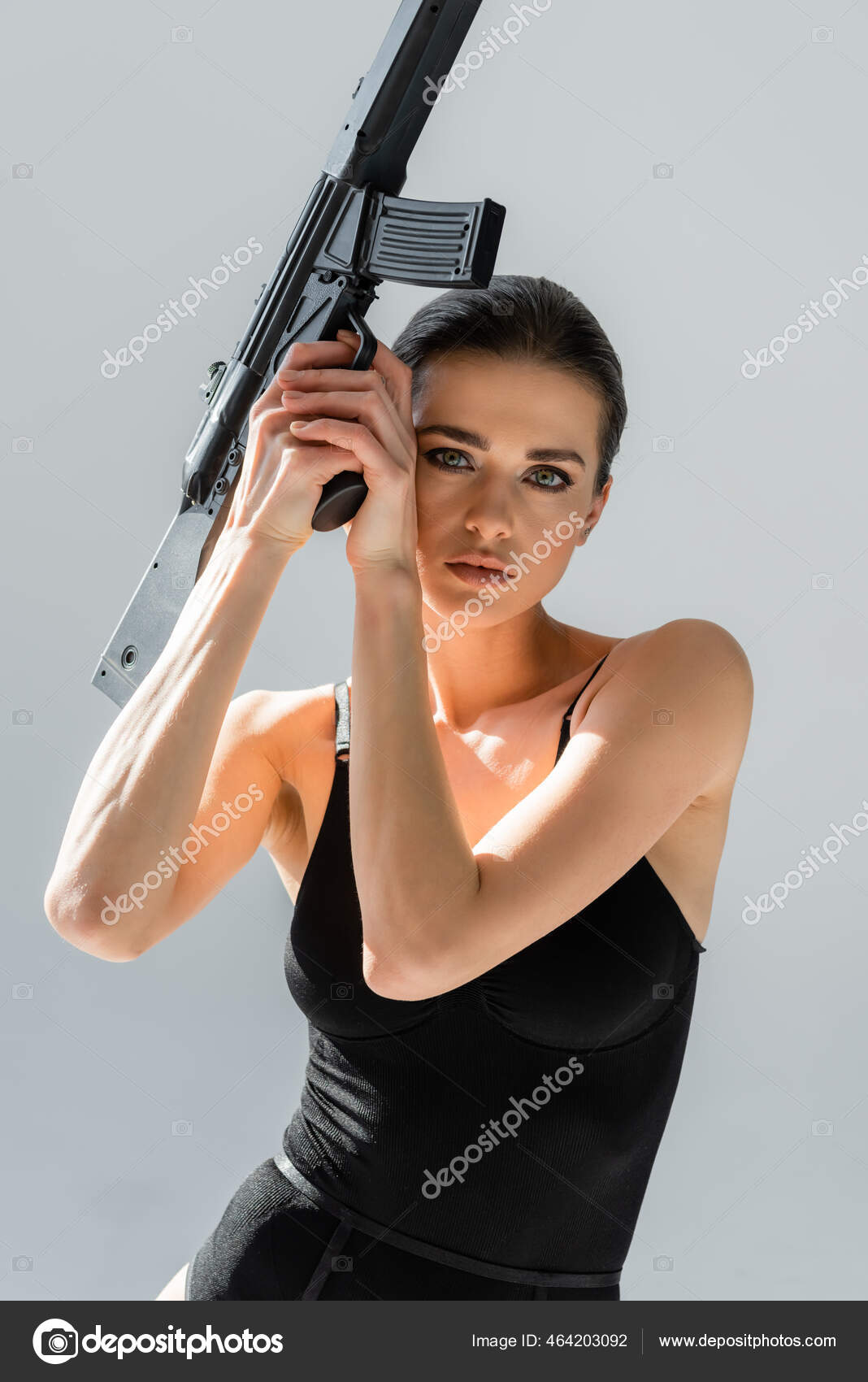 Sensual Woman Looking Camera While Posing Rifle Isolated Grey Stock ...