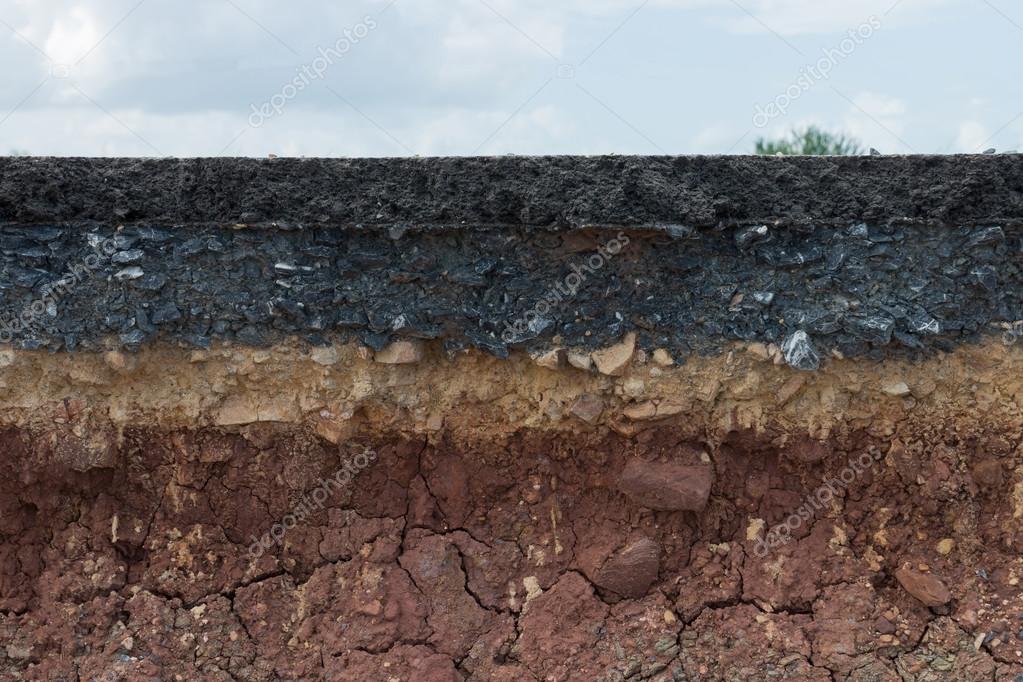 Layers of road with soil and rock. Stock Photo by ©Noppharat_th 121906846
