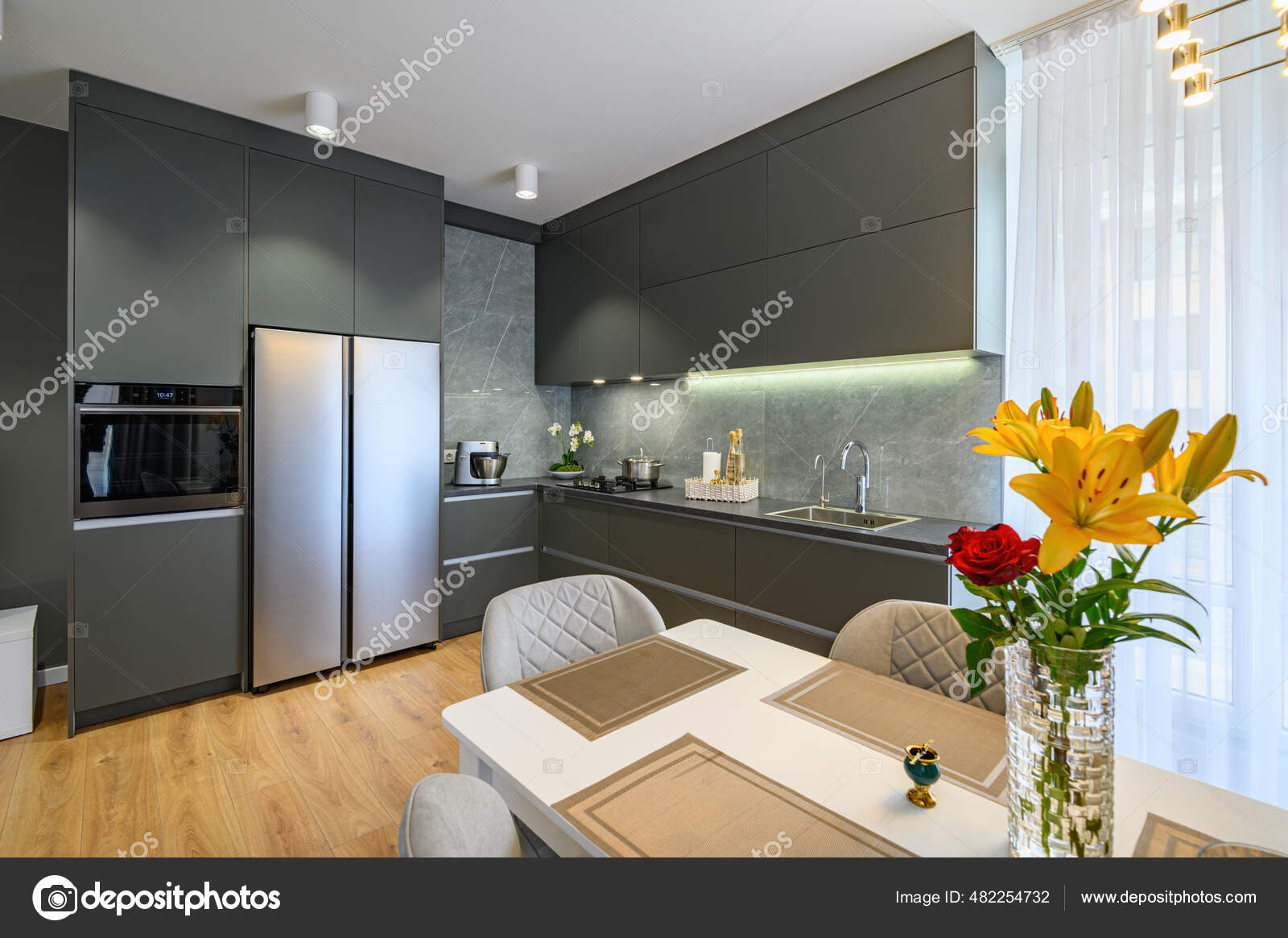 Modern large luxury dark gray kitchen — Stock Photo © starush #482254732