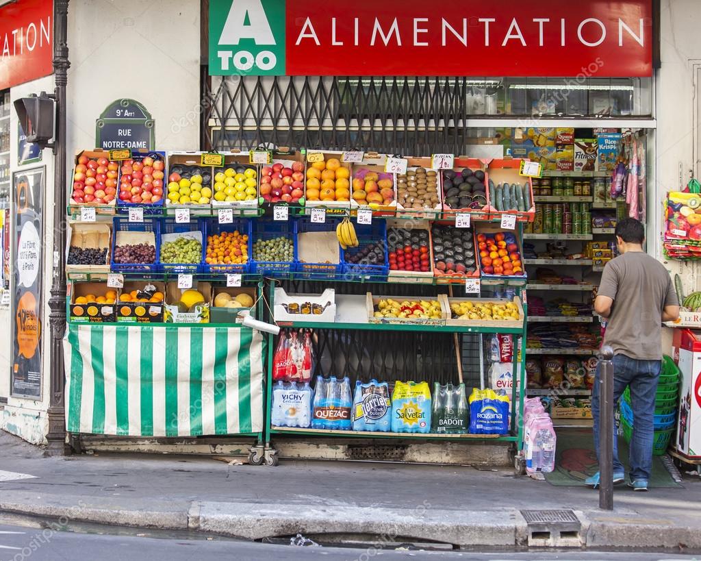 PARIS, FRANCE, on AUGUST 31, 2015. Urban view. A mini-market on the ...
