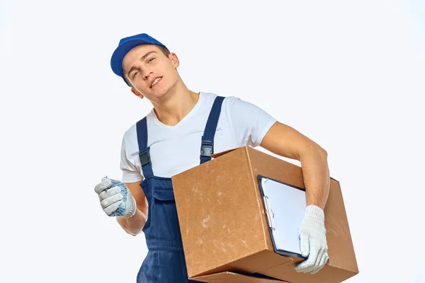 Worker carrying boxes Stock Photos, Royalty Free Worker carrying boxes ...