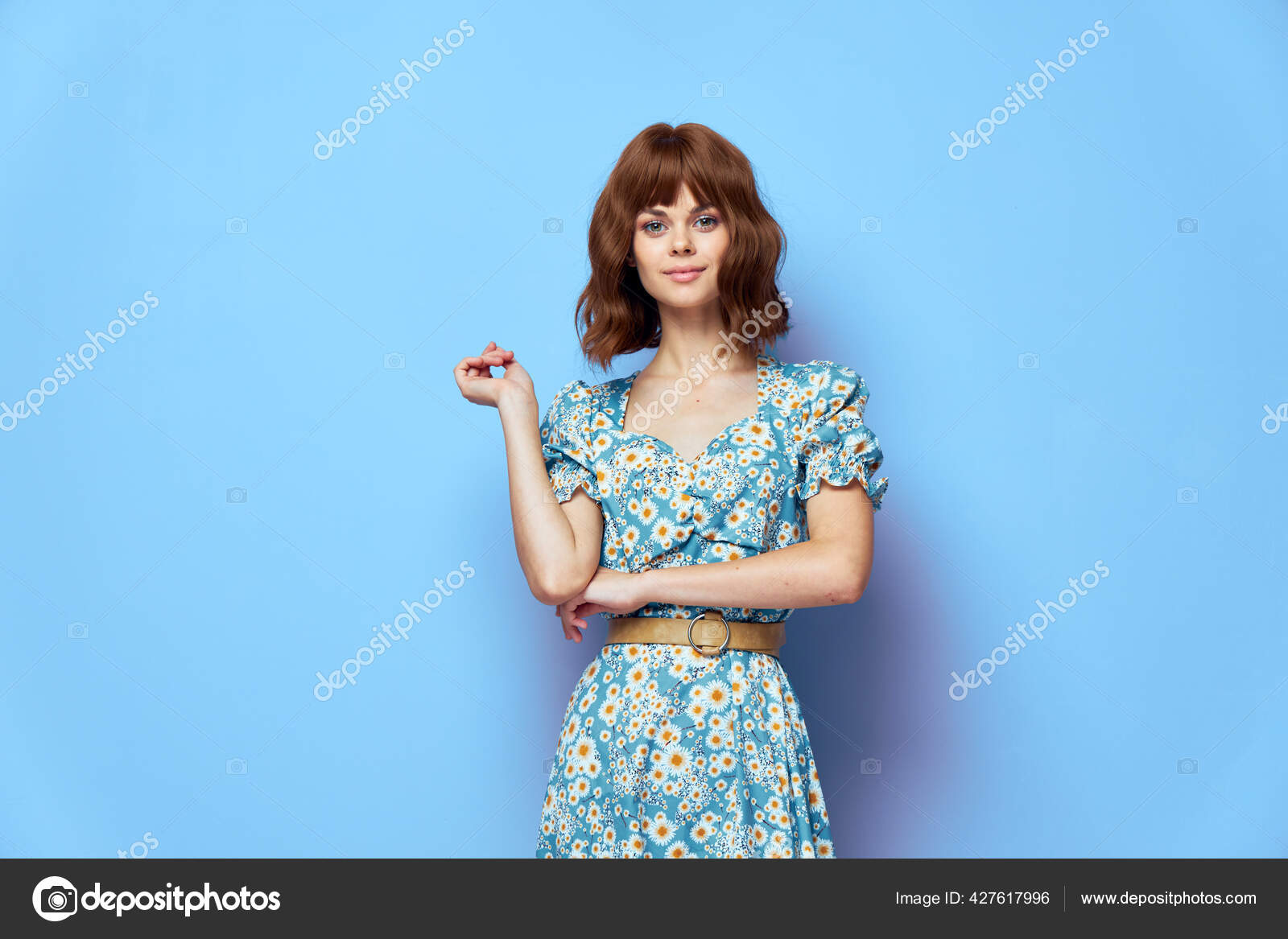 Beautiful Woman Look forward hand near the face fashionable hairstyle ...