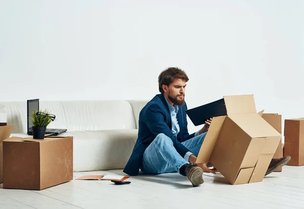 man unpacking boxes stuff office professional job official - Stock ...