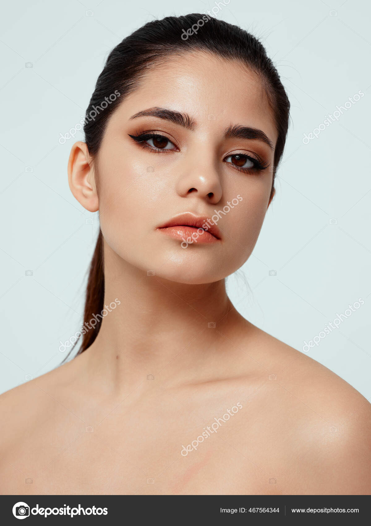 Woman model with bare shoulders and hairstyle on her head — Stock Photo ...