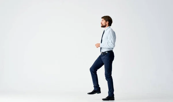 Man Standing Sideways Facing Right
