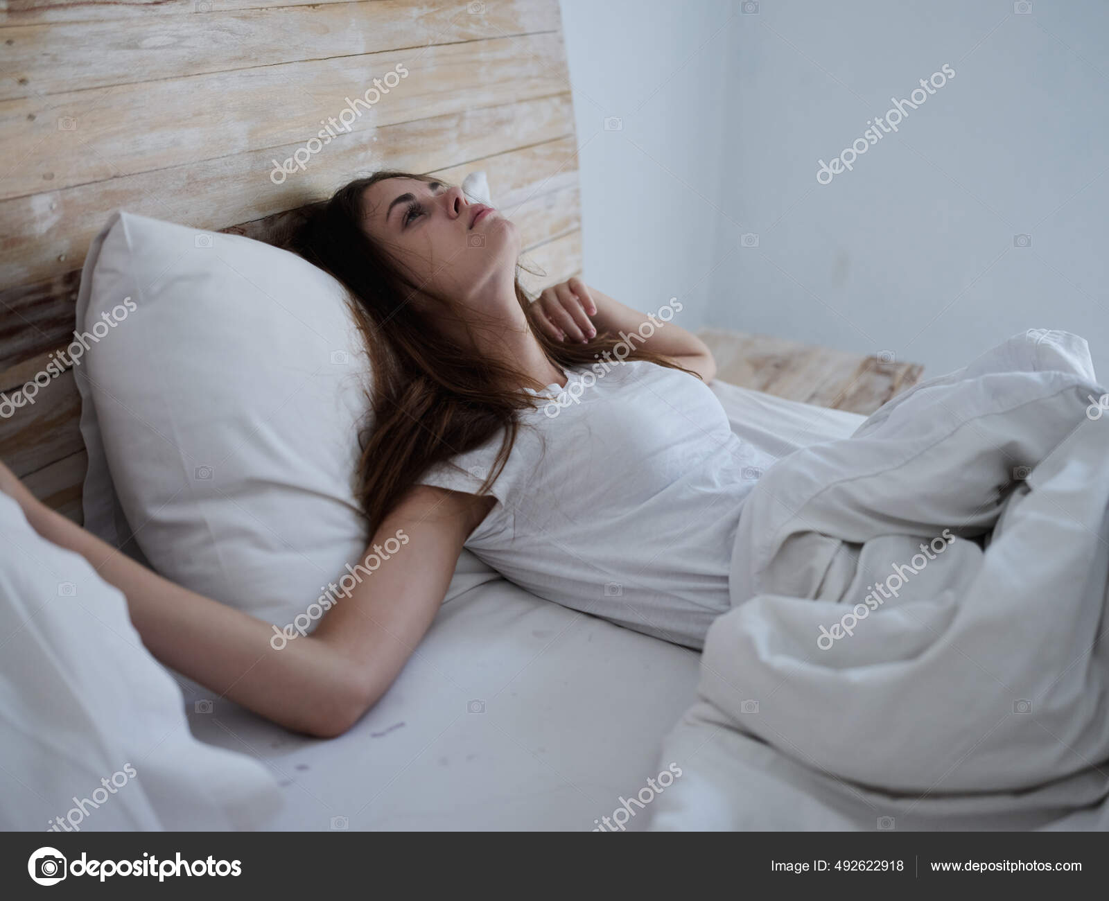 Woman Lying Bed Feeling Unwell — Stock Photo © ShotStudio #492622918