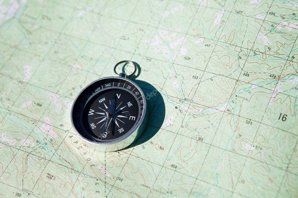 Compass over map Stock Photo by ©vadimrysev 53459793