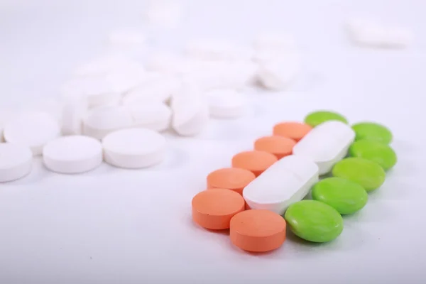 Stack of different pills isolated on white background - Stock Image ...