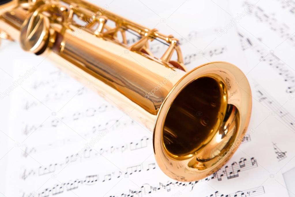 Musical notes and saxophone — Stock Photo © MyraLypa #97420076