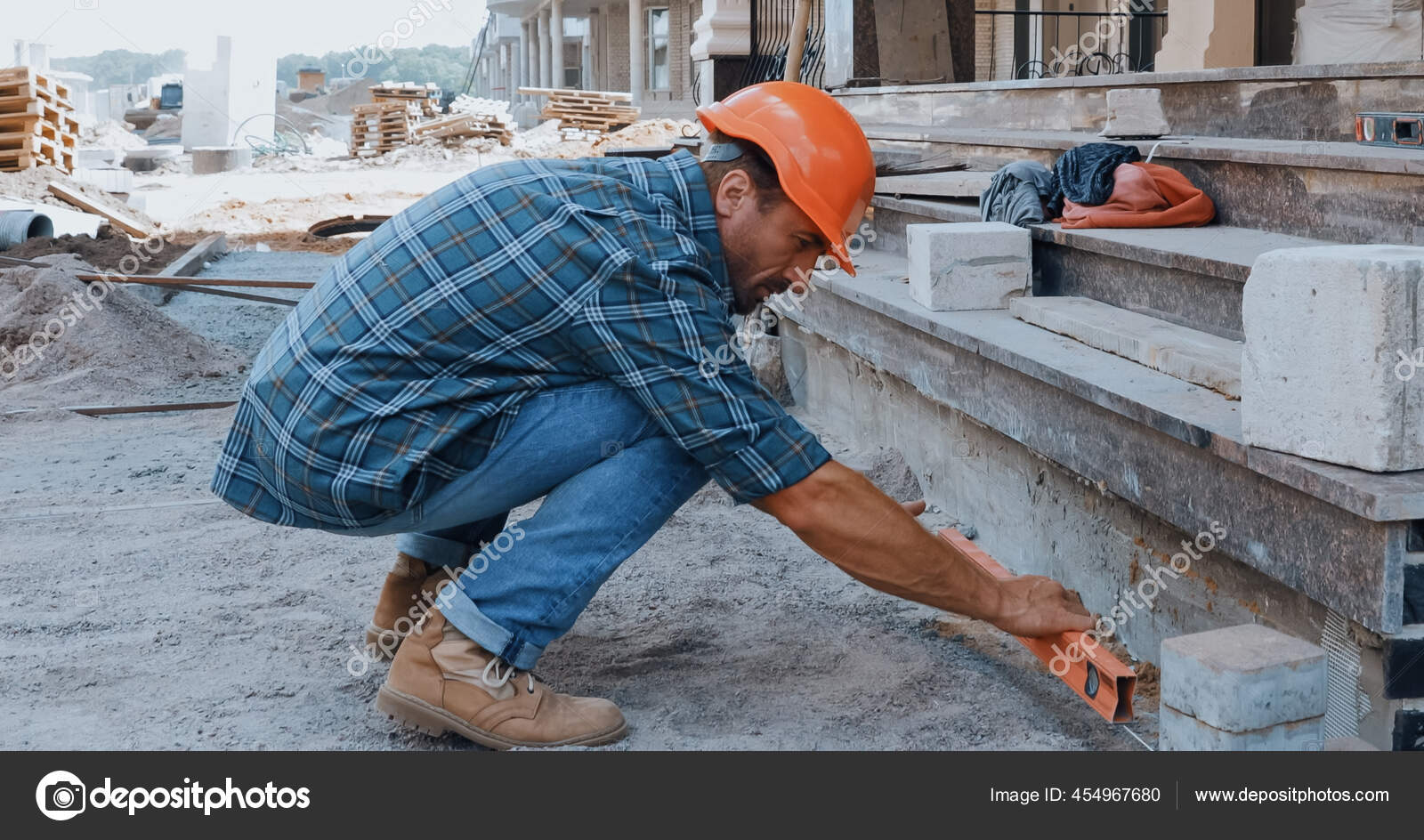 Builder Hard Hat Holding Building Level Construction Site — Stock Photo ...