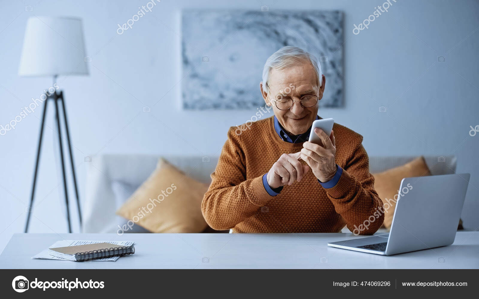 Smiling Elderly Man Sitting Laptop Messaging Smartphone Home — Stock ...