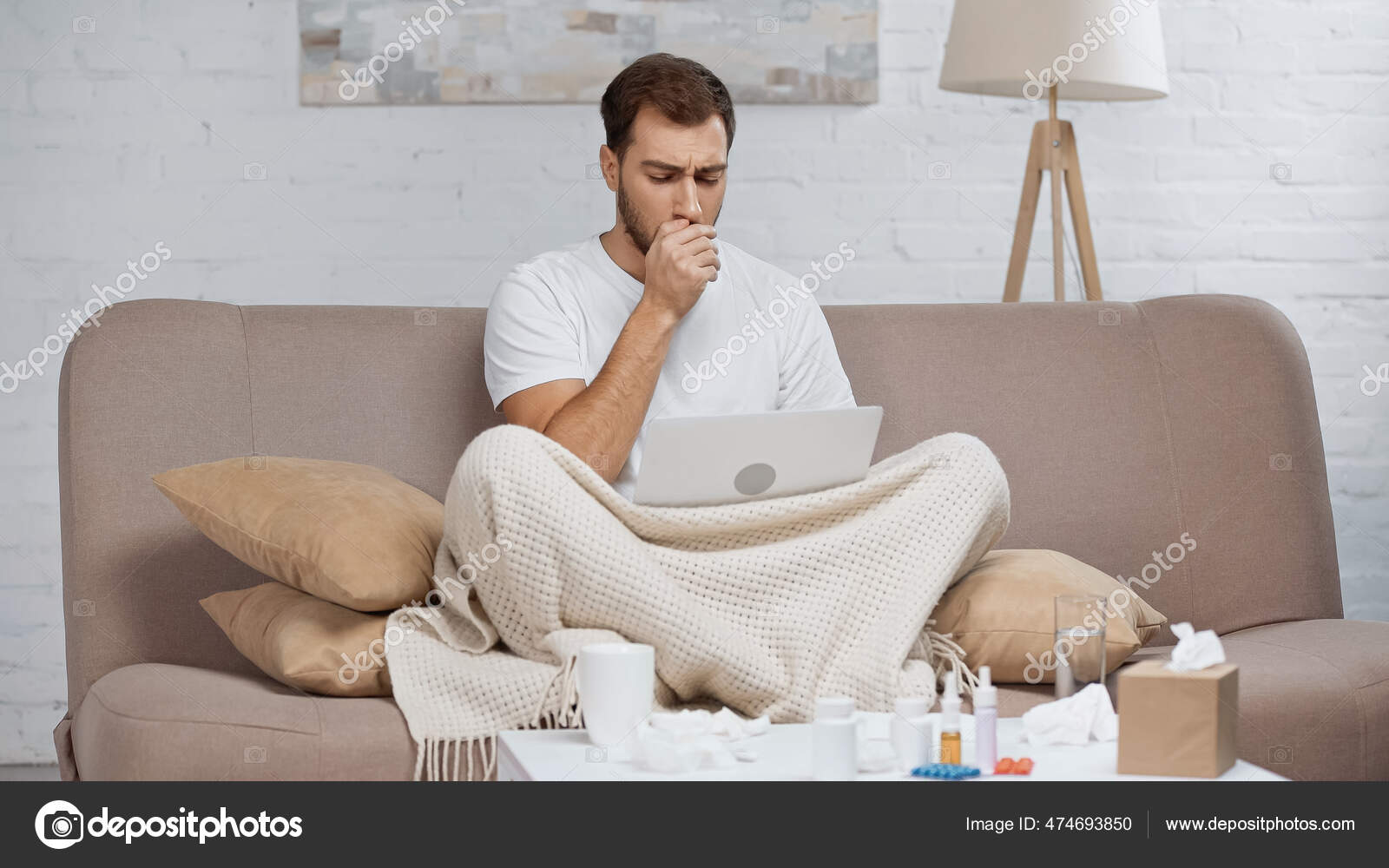 Sick Freelancer Sitting Sofa Using Laptop While Coughing Coffee Table ...
