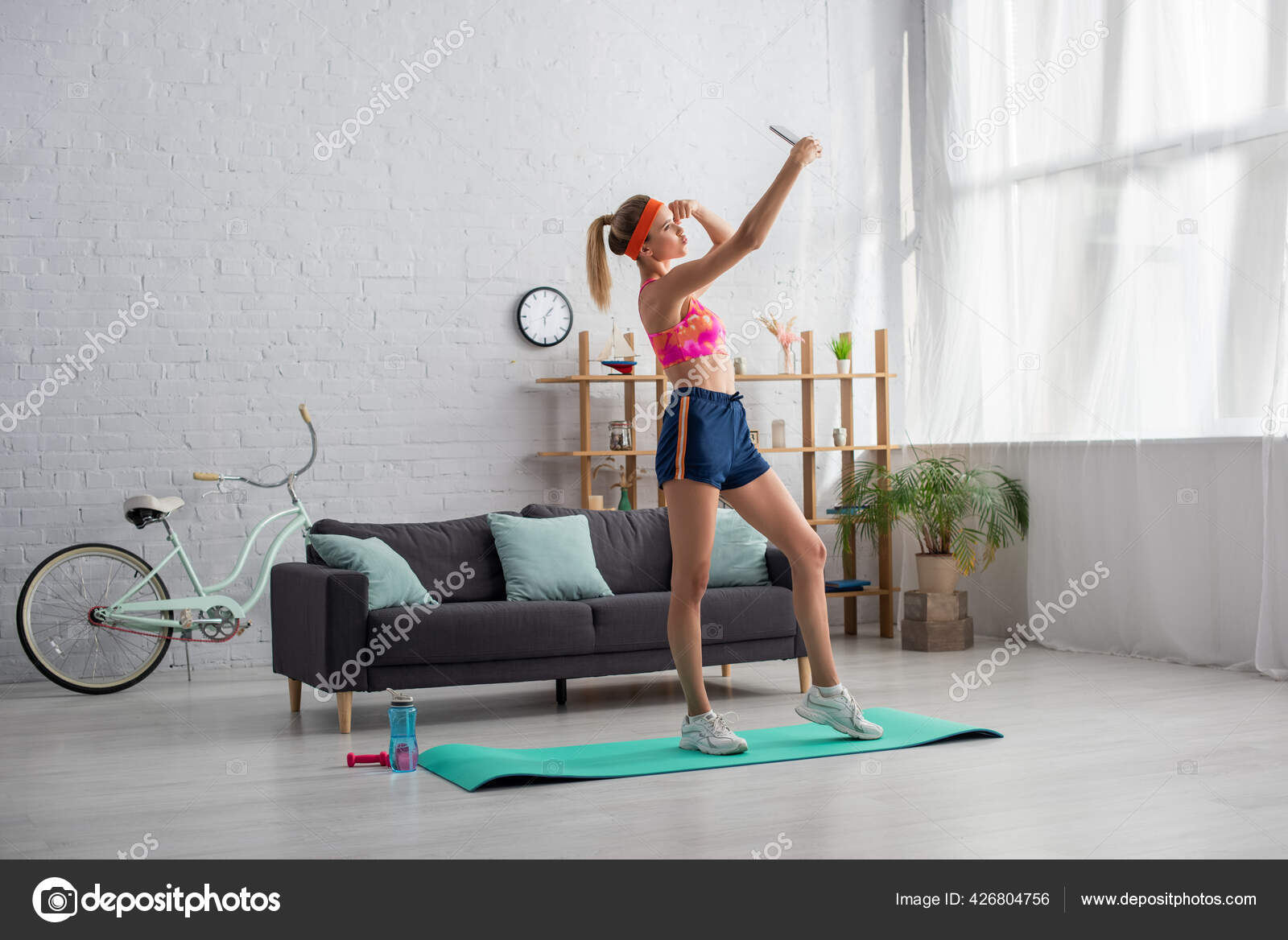 Young Blonde Sportswoman Pouting Lips Taking Selfie While Standing ...