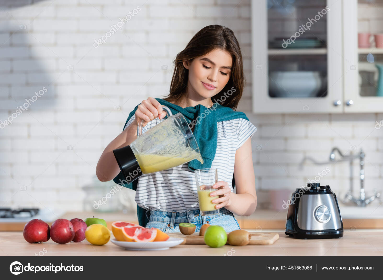 Young Woman Pouring Smoothie Blender Fresh Fruits Kitchen Stock Photo ...