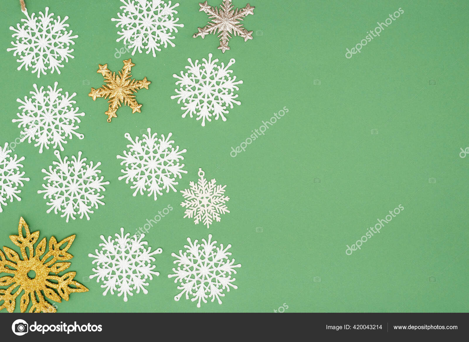 Top View Decorative White Golden Silver Snowflakes Green Background ...