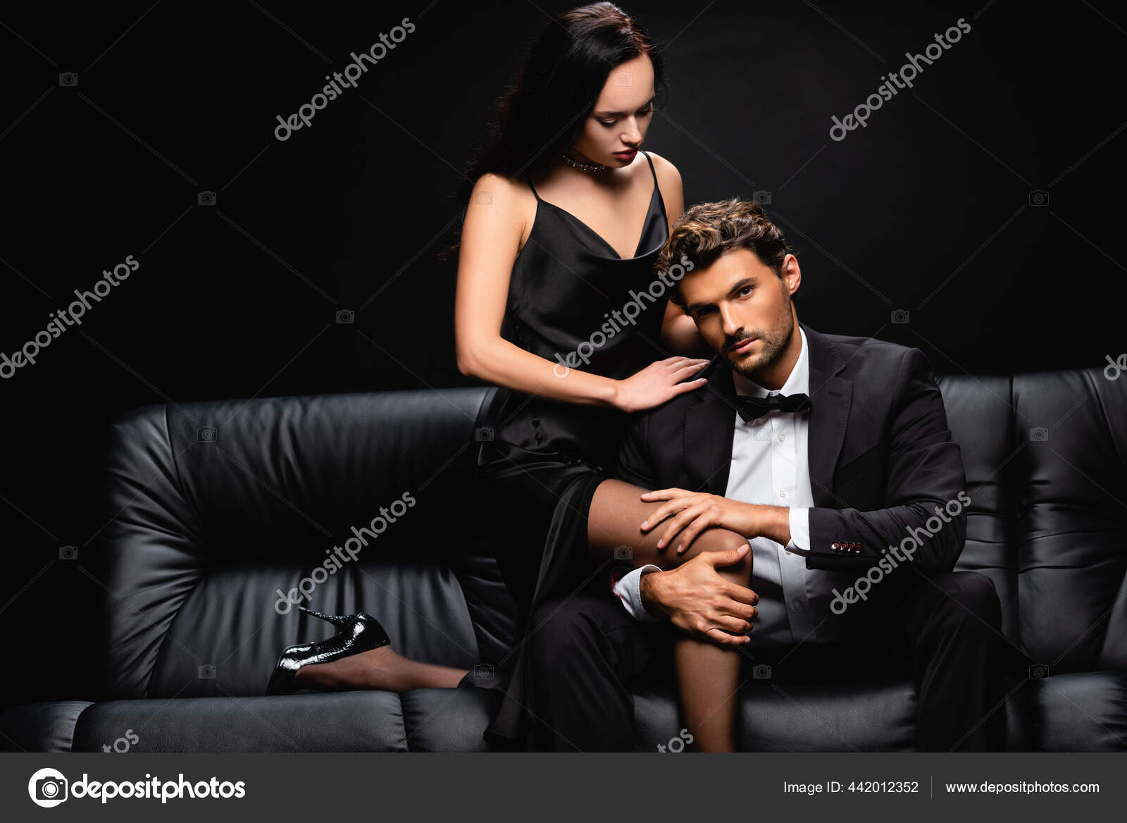 Elegant Man Hugging Leg Sexy Woman While Sitting Leather Sofa Stock ...