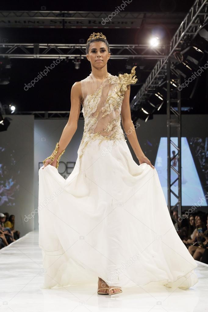 SCOTTSDALE, AZ OCTOBER 3 Models showcasing designs during a runway ...