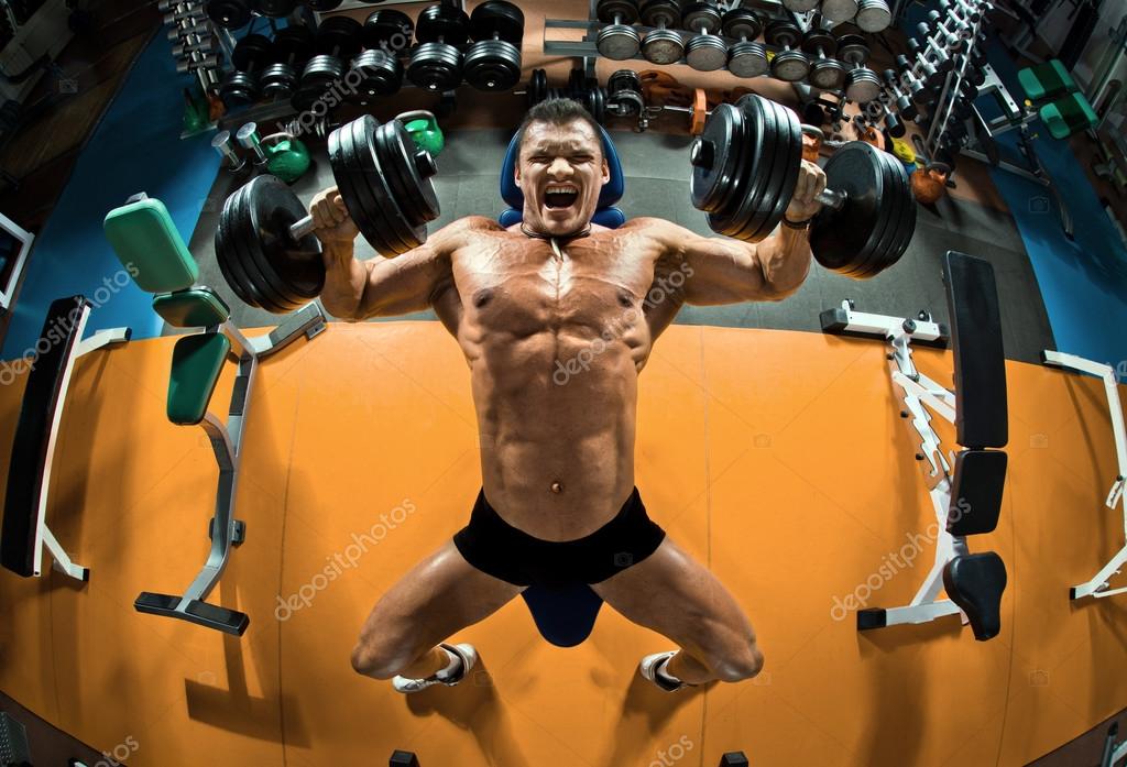 Bodybuilder in gym — Stock Photo © tankist276 #57753919