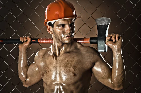 Workman with big heavy axe Stock Photo by ©tankist276 44625731