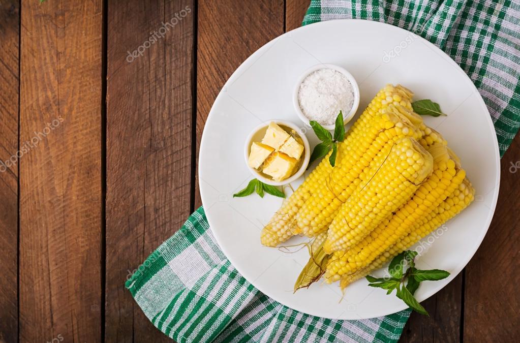 Boiled corn with salt and butter Stock Photo by ©timolina 116681080