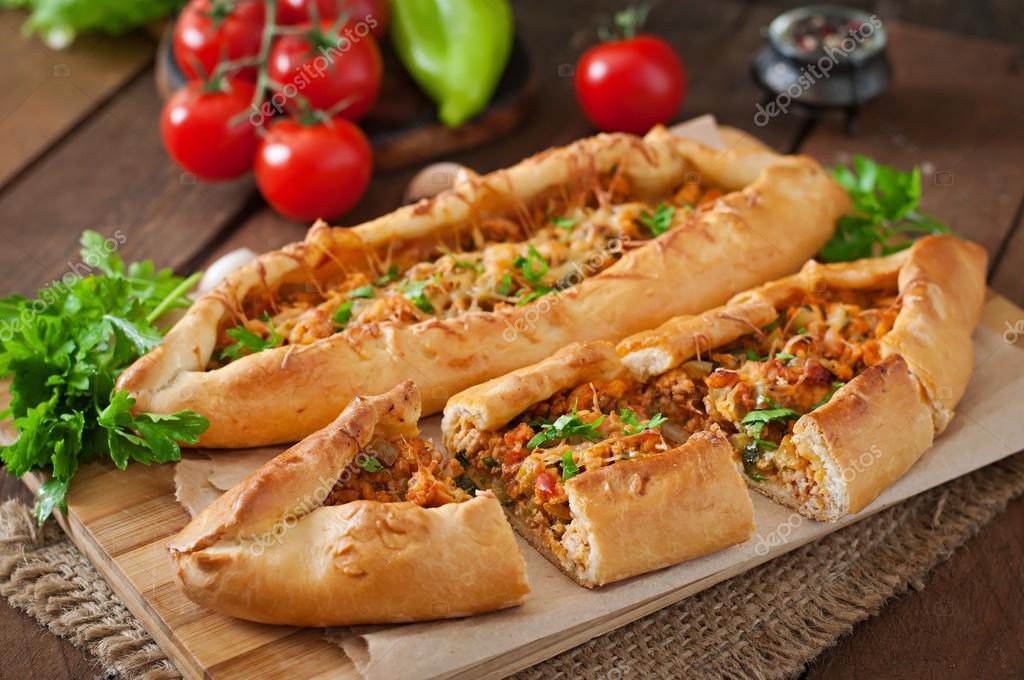 Turkish pides with beef and vegetables — Stock Photo © timolina #77758614