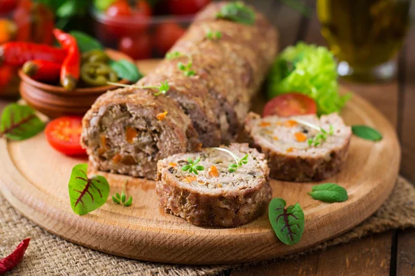 Minced meat loaf roll with mushrooms and carrots. — Stock Photo ...