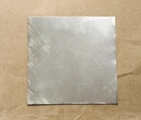 Blank square metal plate Stock Photo by ©Garsya 112272404