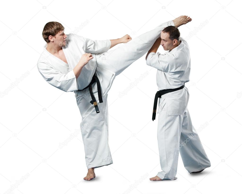 Karate fighters in action Stock Photo by ©Garsya 120376114