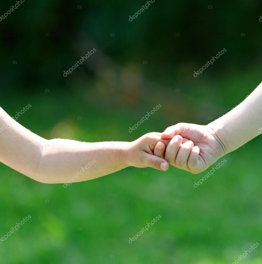 Children hand in hand Stock Photo by ©Garsya 52538737