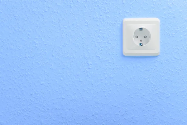 Single electric socket with plug Stock Photo by ©Garsya 65788341