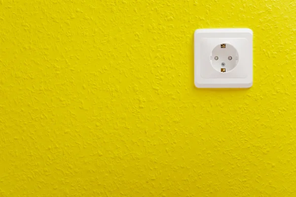 Single electric socket with plug Stock Photo by ©Garsya 65788341