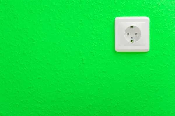 Single electric socket with plug Stock Photo by ©Garsya 65788341