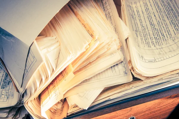 Dirty messy paper documents Stock Photo by ©Garsya 65788789