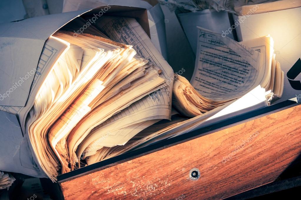 Dirty messy paper documents Stock Photo by ©Garsya 65788057