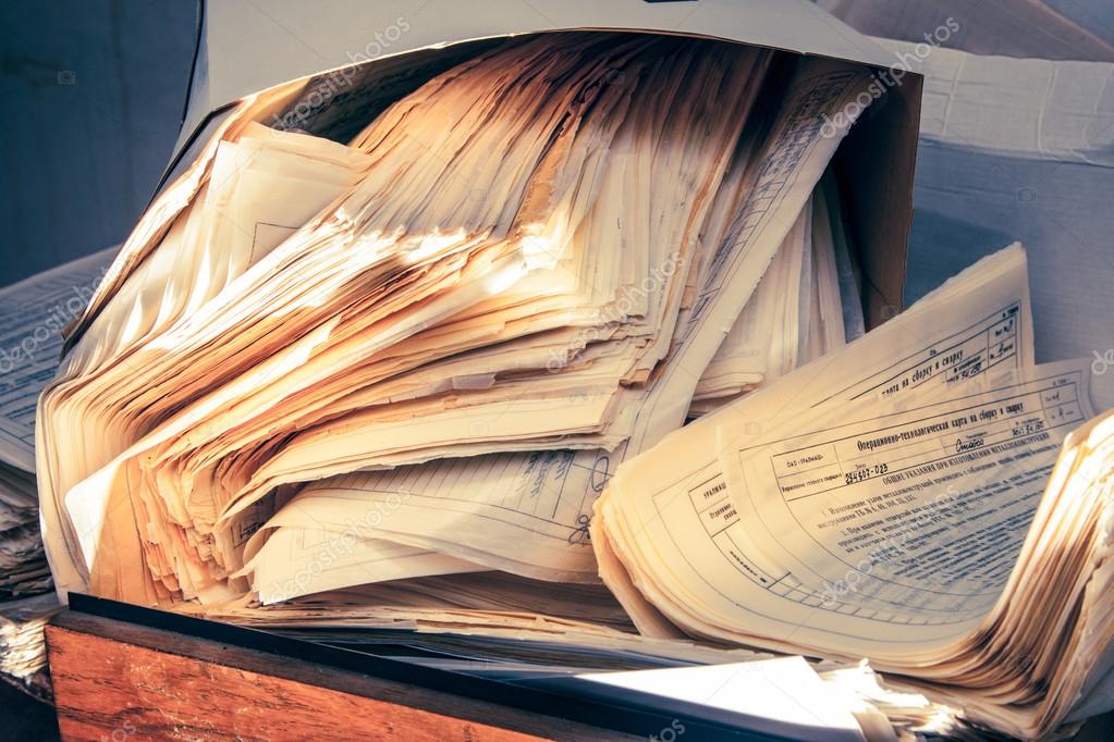 Dirty messy paper documents Stock Photo by ©Garsya 65788789