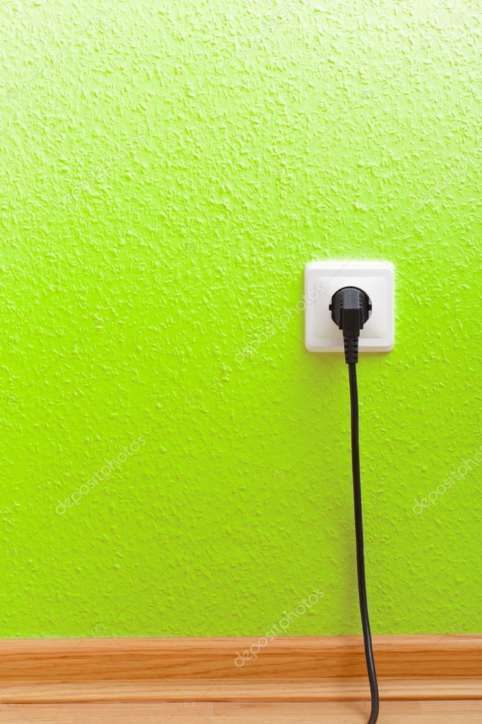 Single electric socket with plug Stock Photo by ©Garsya 65788975