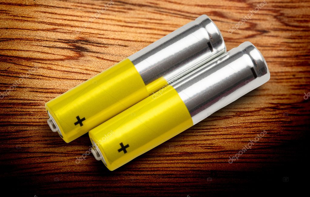 Two batteries with plus signs Stock Photo by ©Garsya 71501869